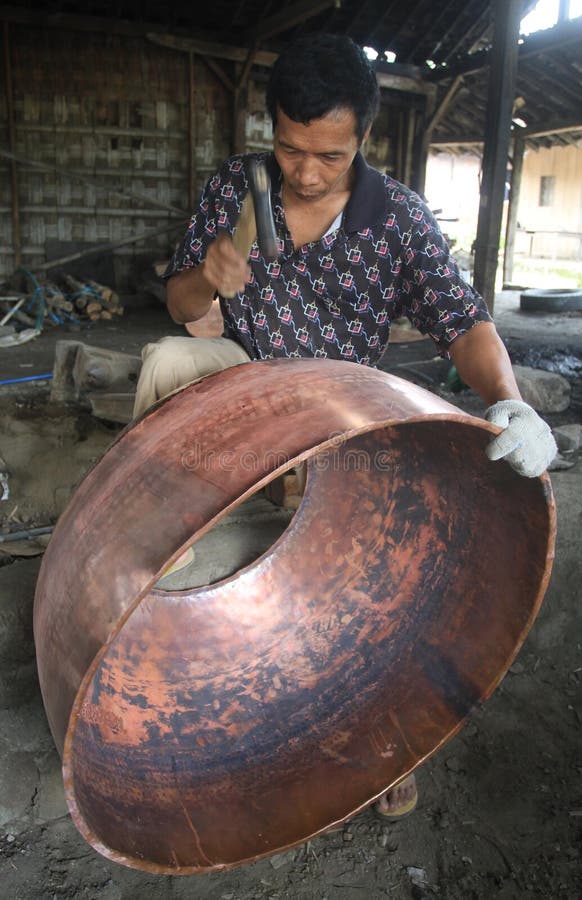 Copper craft editorial image. Image of working, central - 35478395