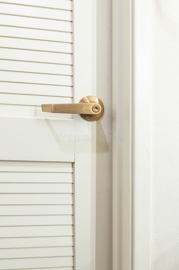 Copper Door Handle on a White Wooden Door.Door Handles Elements Close ...