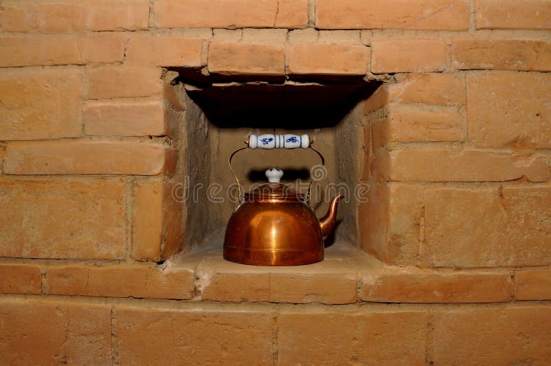 Copper kettle stock photo. Image of niche, kettle, brick - 28534822