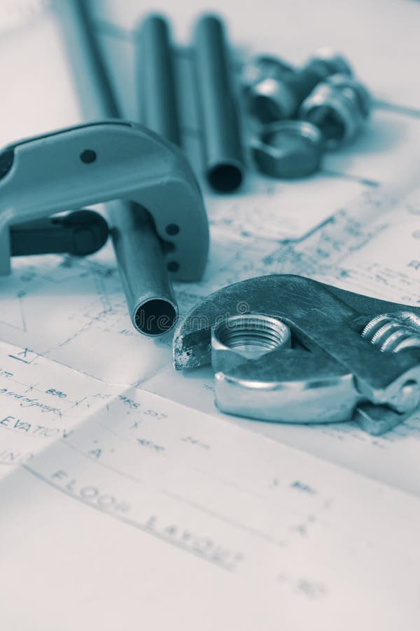 Copper Pipe Cutter and Adjustable Spanner Wrench Tools on a Set of ...