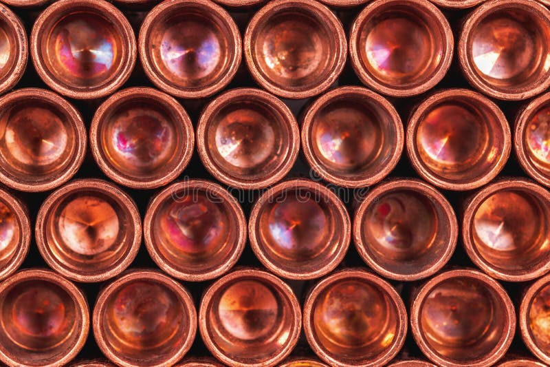 Copper Pipes in Neat Rows Close-up. Selective Focus Stock Image - Image ...