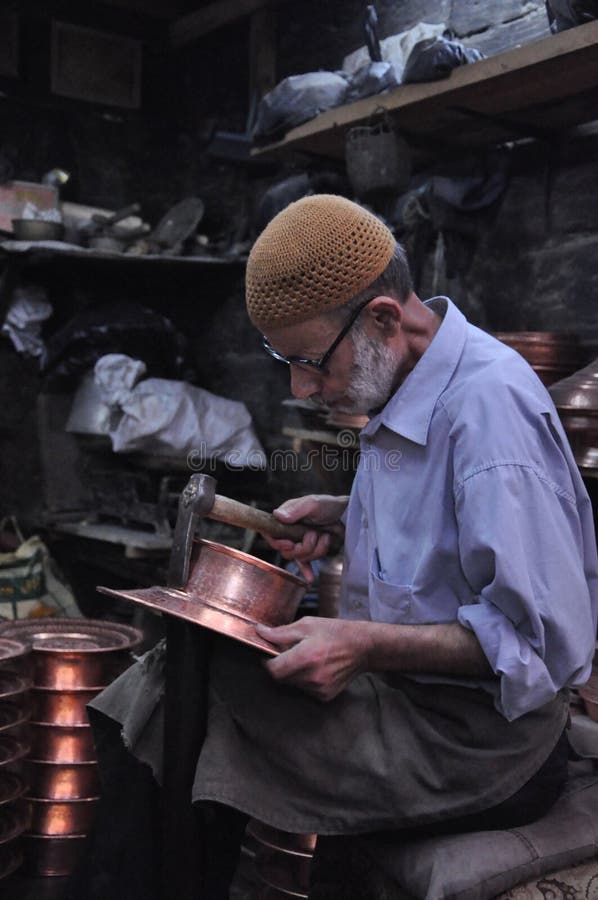 Copper smith at work editorial photography. Image of forging - 23402232