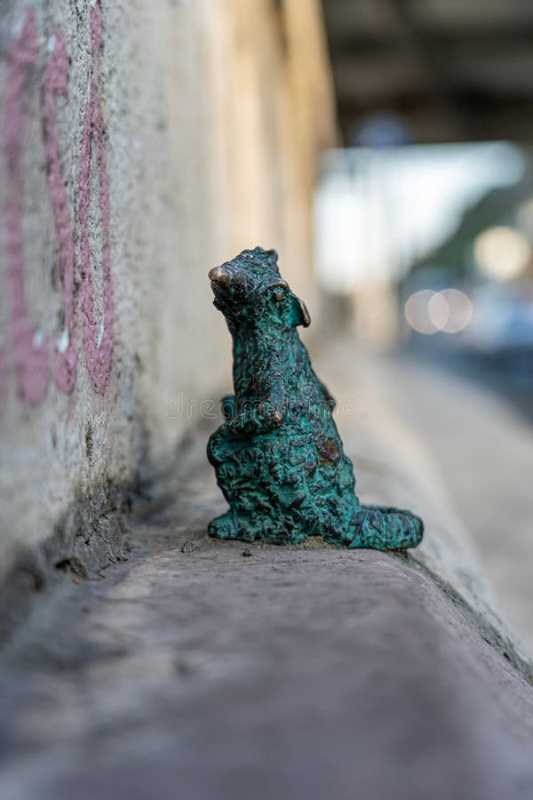 Copper statue on a stone stock image. Image of copper - 266571115