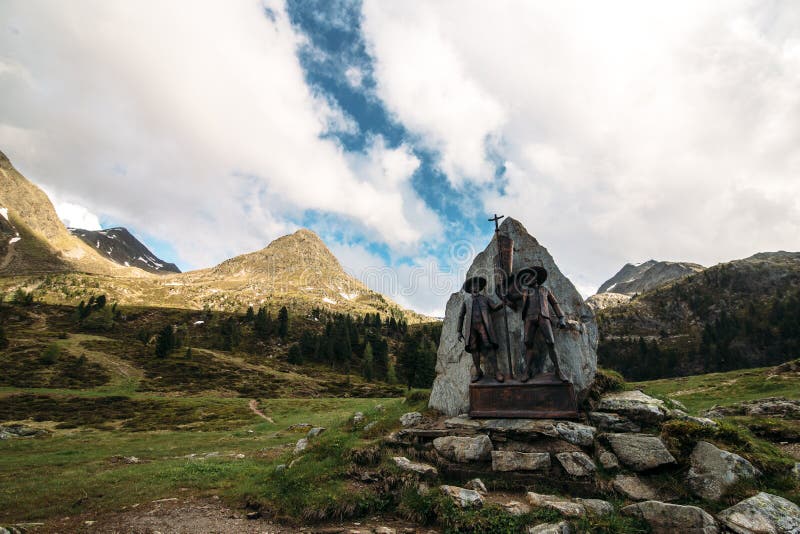 Copper Statue of Two People on a Background of Stone in the Italian ...
