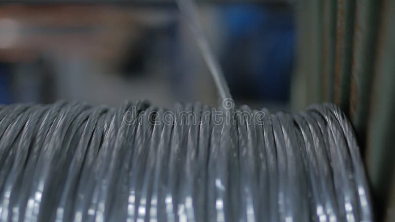 Winding Cable on a Rotating Coil. Production of Electric Cable. Stock ...