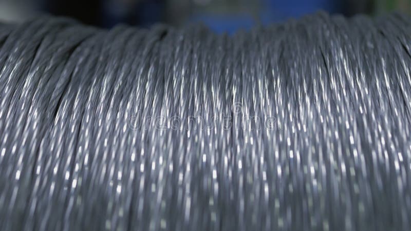 Winding Cable on a Rotating Coil. Production of Electric Cable. Stock ...