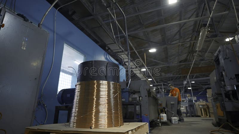 Copper Wire on Industrial Coil with Working. Creative Stock Photo ...