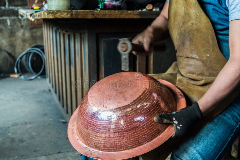 Coppersmith working stock photo. Image of manufacture - 67024236