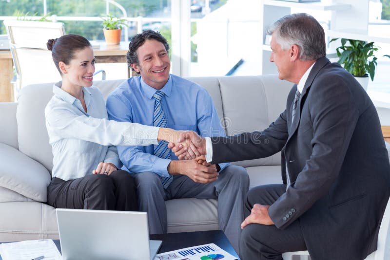 Coppie Nella Riunione Con Un Consulente Finanziario Fotografia Stock ...