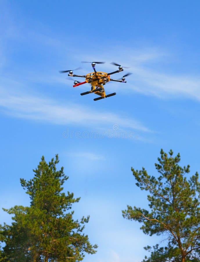 Copter flying in the sky stock photo. Image of stability - 60404398