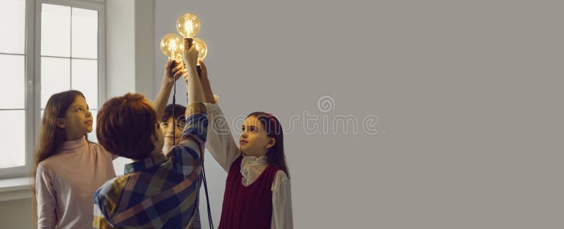 Kids Holding Lightbulbs Stock Photos - Free & Royalty-Free Stock Photos ...