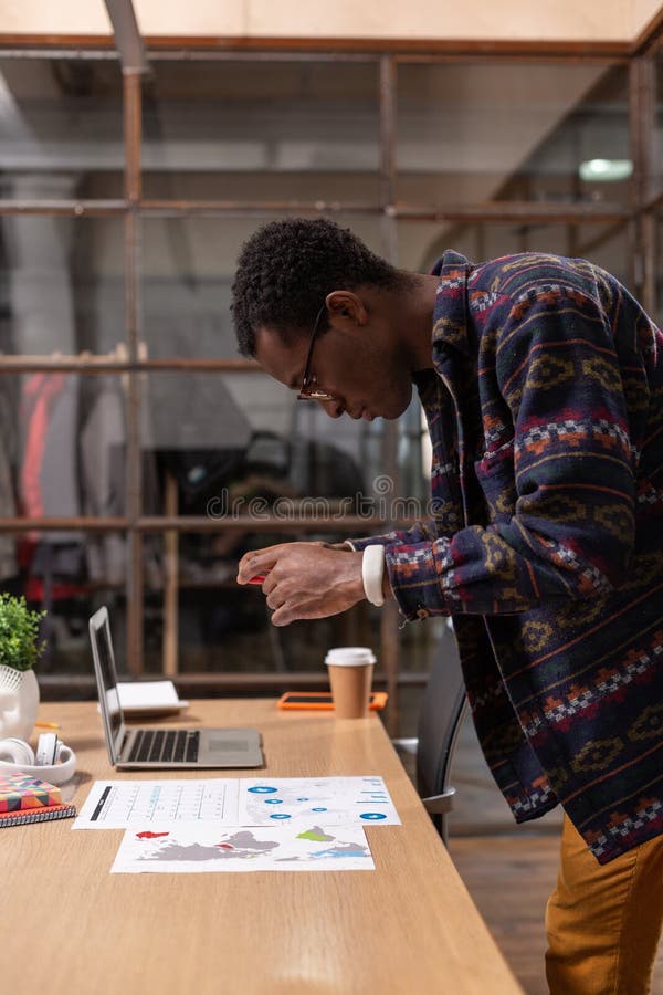 Man Taking Pictures of Paper Documents Using a Smartphone Stock Image ...