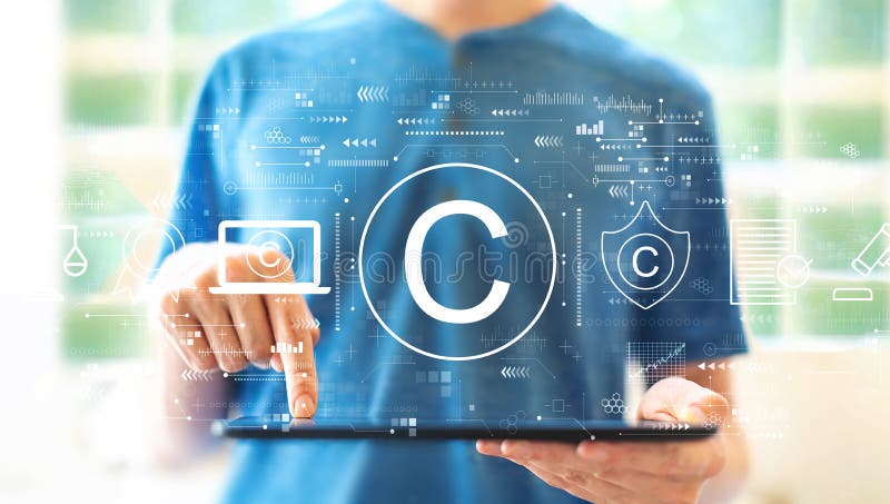 Copyright Concept with Man Using a Tablet Stock Image - Image of ...