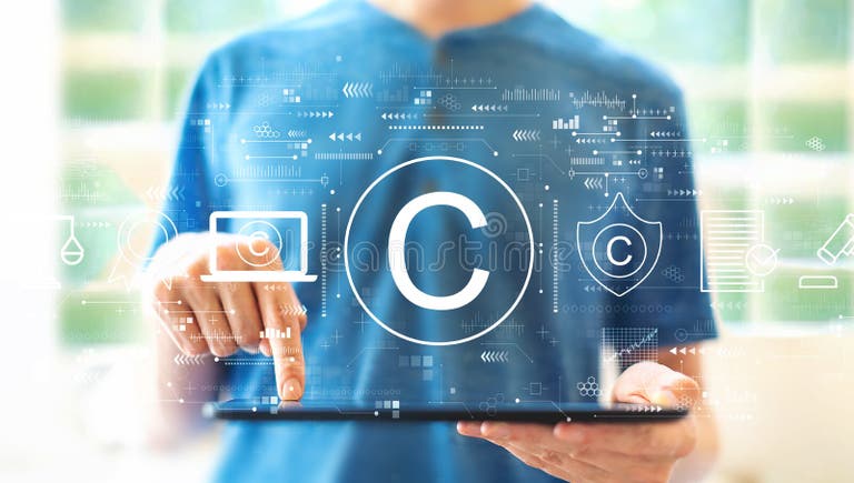 Copyright Concept with Man Using a Tablet Stock Image - Image of ...