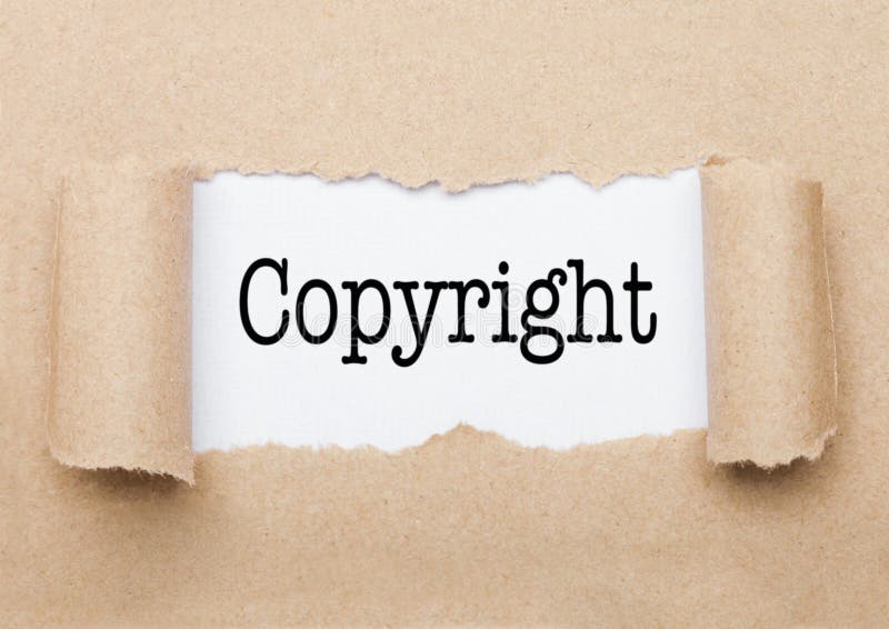 Copyright Text Appearing Behind Torn Brown Paper Stock Photo - Image of ...