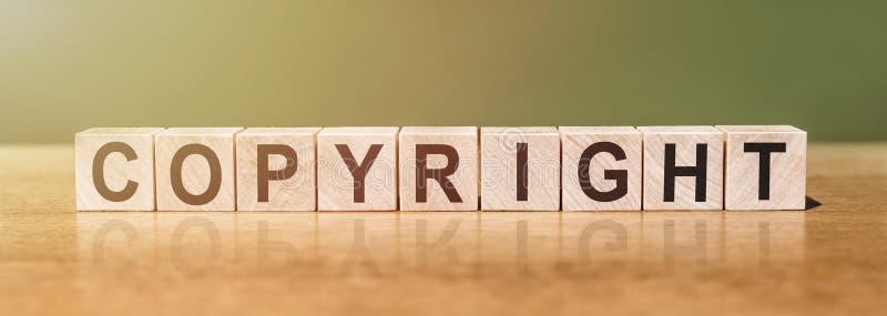 COPYRIGHT Word Written on Wooden Blocks on Wooden Table. Concept for ...