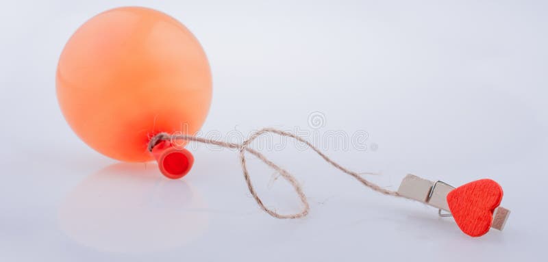 Corazón Atado a Un Baloon Con Una Secuencia Imagen de archivo - Imagen ...