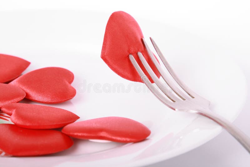 Corazón Perforado Por La Fork Foto de archivo - Imagen de alimento ...