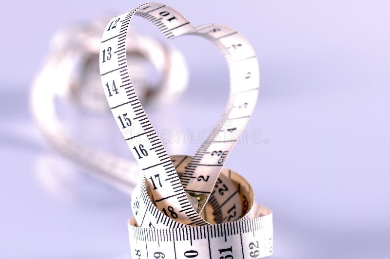 Corazón por la medida foto de archivo. Imagen de exactitud - 23096922