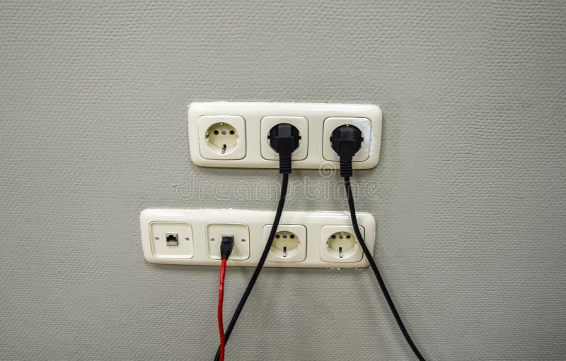 Cord Cables Plugged into Plugs for Internet, Network and Electricity on ...