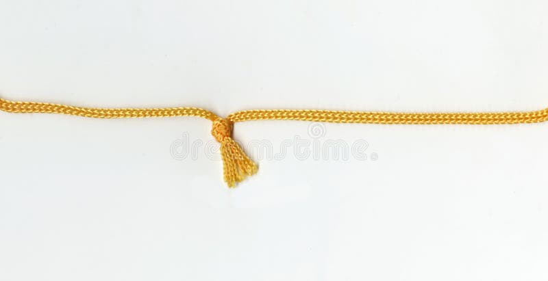 Corde jaune avec un noeud photo stock. Image du abstrait - 62931150