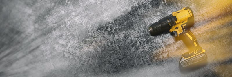 Cordless Drill Close-up on Textured Surface. Construction Concept and ...