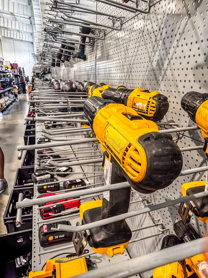 Cordless Yellow Drills Aligned on Hardware Shop Display Stock Photo ...