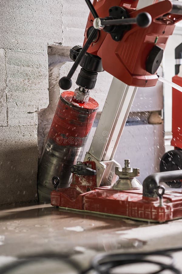 Core Drilling into Concrete Wall during Construction Work Stock Photo ...