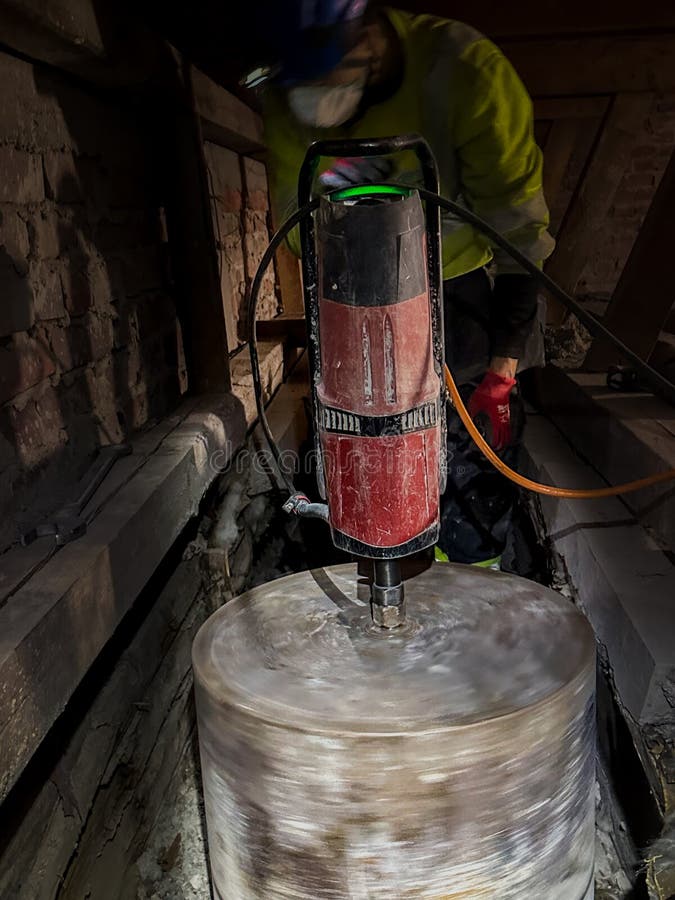 Core Drilling Huge Opening in Tight Space Stock Photo - Image of stand ...