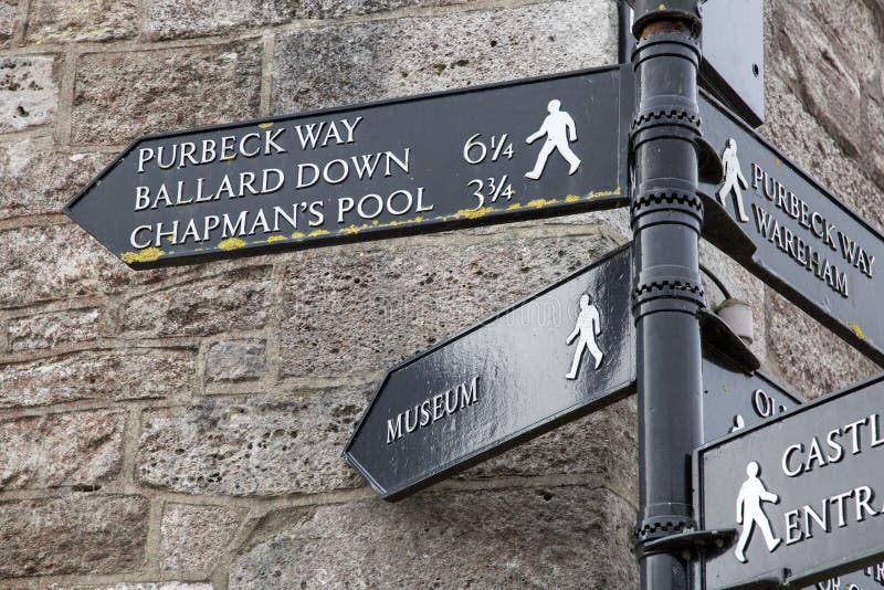 Corfe Castle Walking Signpost, Dorset, England Editorial Photography ...