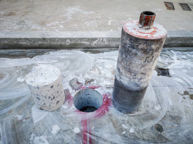 Coring Hole on Concrete Floor with a Professional Tool with a Diamond ...