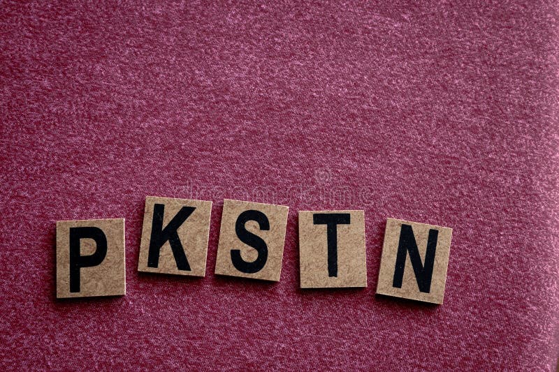 Cork Scrabble Tiles Displaying Random Letters on Red Fabric Background ...