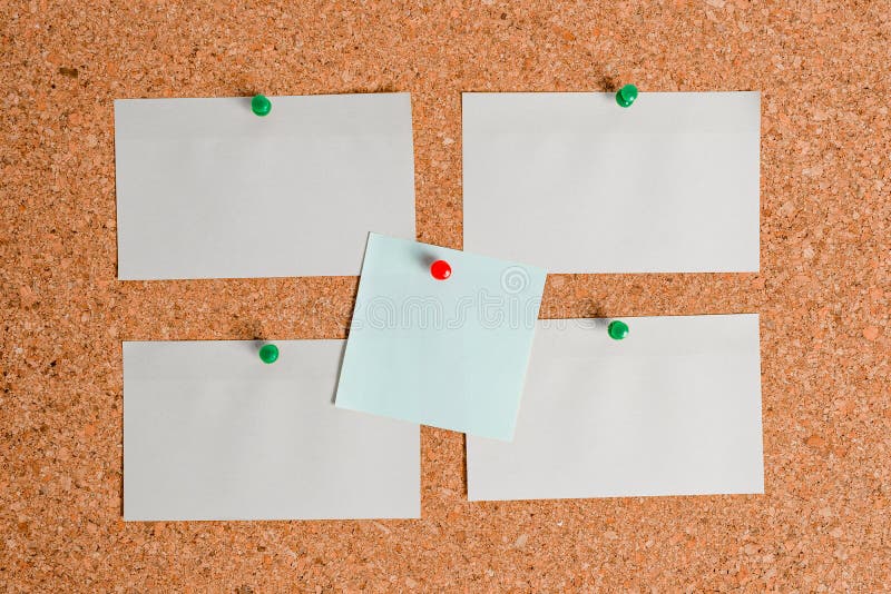 Corkboard with Different Color and Size Papers Fixed by a Pin ...