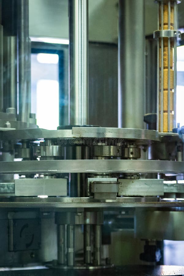 Corking device at winery stock image. Image of belt - 119952693