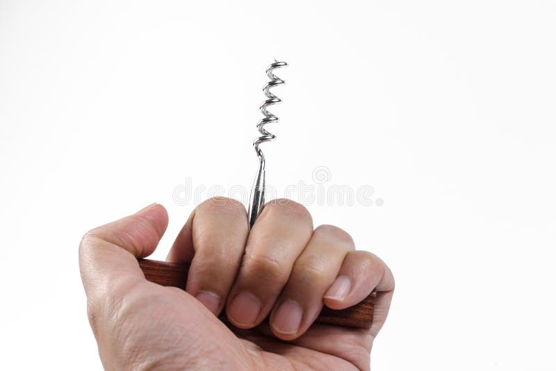 Corkscrew in hand stock photo. Image of corkscrew, white - 15337716