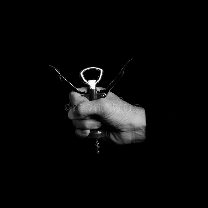 Corkscrew in hand stock photo. Image of corkscrew, white - 15337716