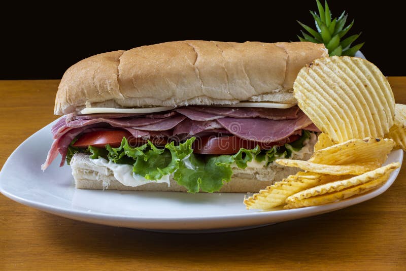 Corn Beef Sandwich with a Side of Potato Chips Stock Photo - Image of ...