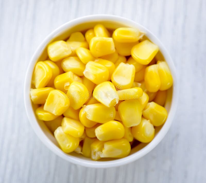 Corn in a bowl on wood stock image. Image of closeup - 119535667