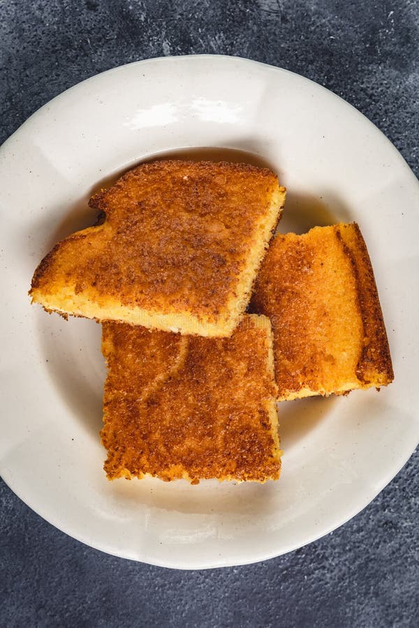 Corn Bread Squares Slices on Dark Rustic Background Stock Photo - Image ...