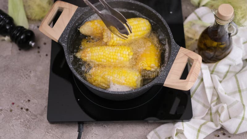 Corn Cobs Cooking in a Pot with Boiling Hot Water Stock Video - Video ...