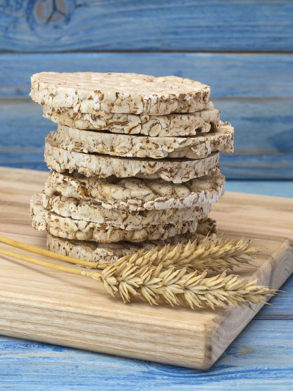 Corn Crackers on a Blue Wooden Table. Stock Photo - Image of blue, food ...