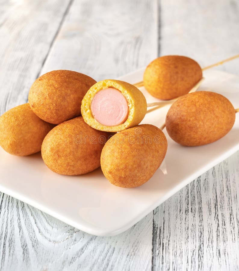 Corn Dogs on White Serving Plate Stock Photo - Image of fast, coated ...