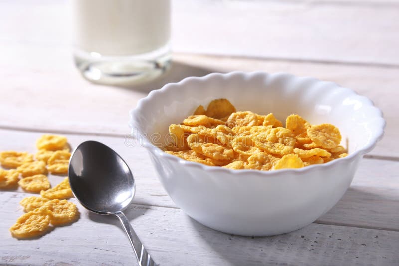 Corn Flakes Cereal in a Bowl and Glass with Milk. Morning Breakfast ...