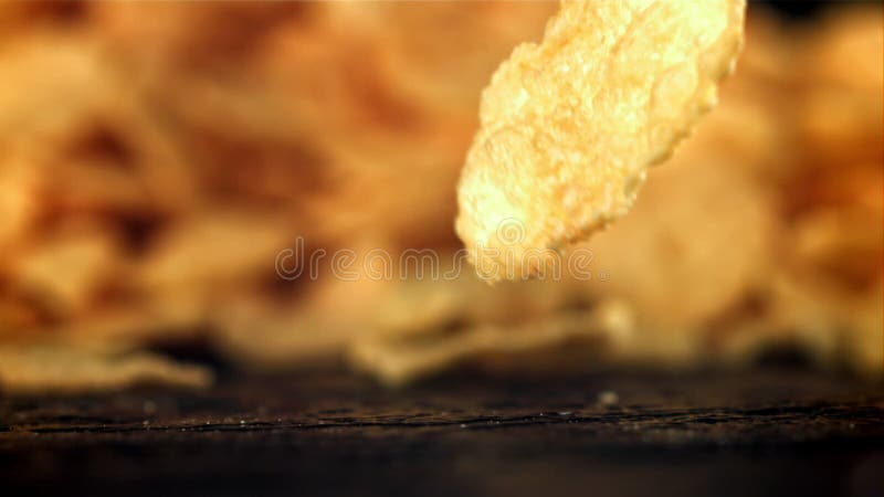 Corn Flakes Falling on Black Background. Filmed on a High-speed Camera ...
