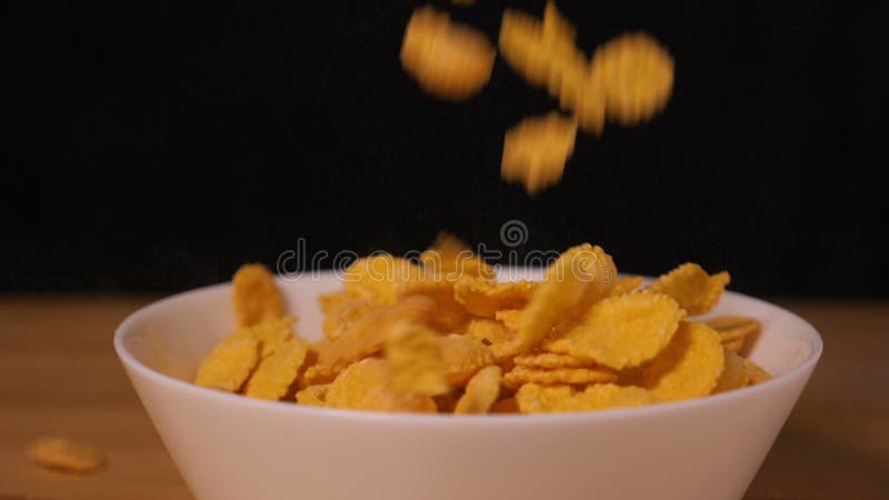 Corn Flakes Falling into a Plate Stock Footage - Video of snack ...