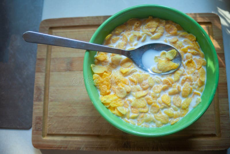 Corn Flakes with Milk in a Bowl with a Spoon Stock Photo - Image of ...
