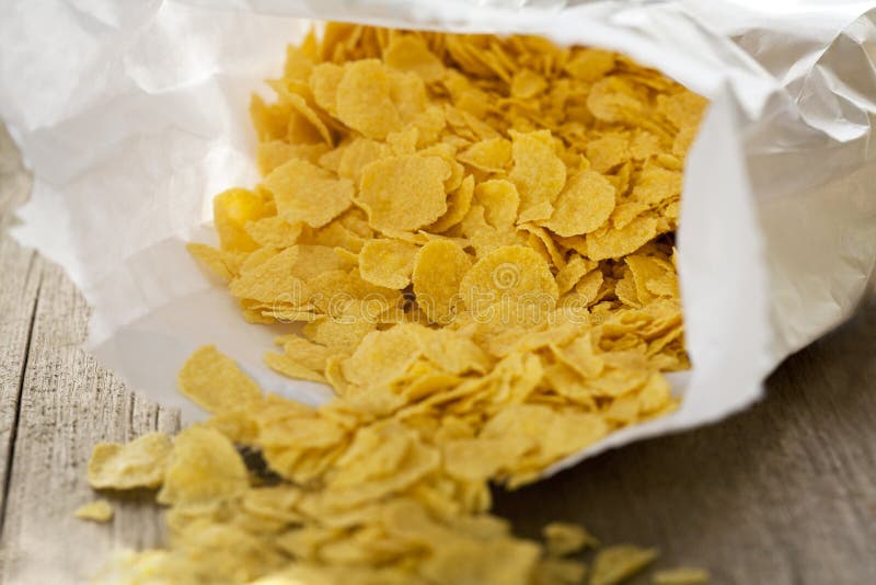 Corn Flakes on Wooden Table Stock Image - Image of cornflakes, food ...