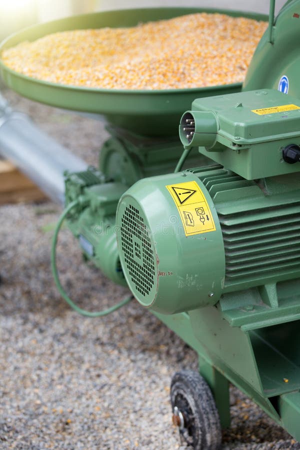 Corn grinding mill stock photo. Image of green, container - 72898776