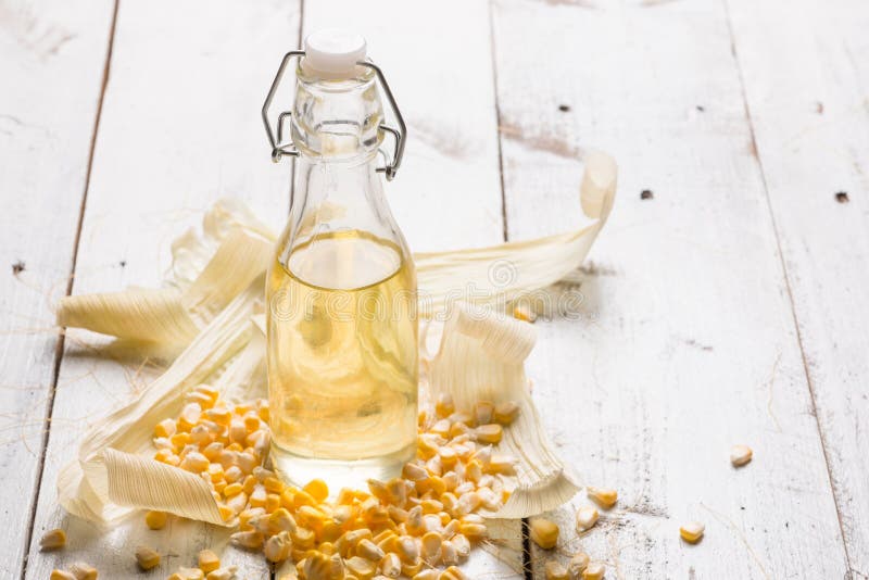 Corn Oil and Corn on Rustic Wood Background Stock Image - Image of ...