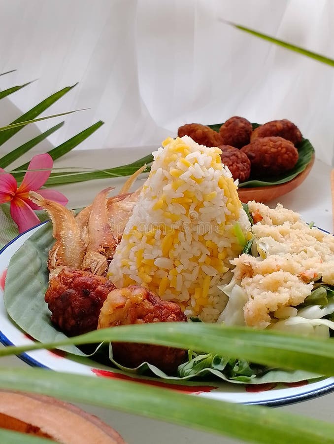 Corn Rice Complete with Urap Side Dishes and Salted Fish Stock Image ...
